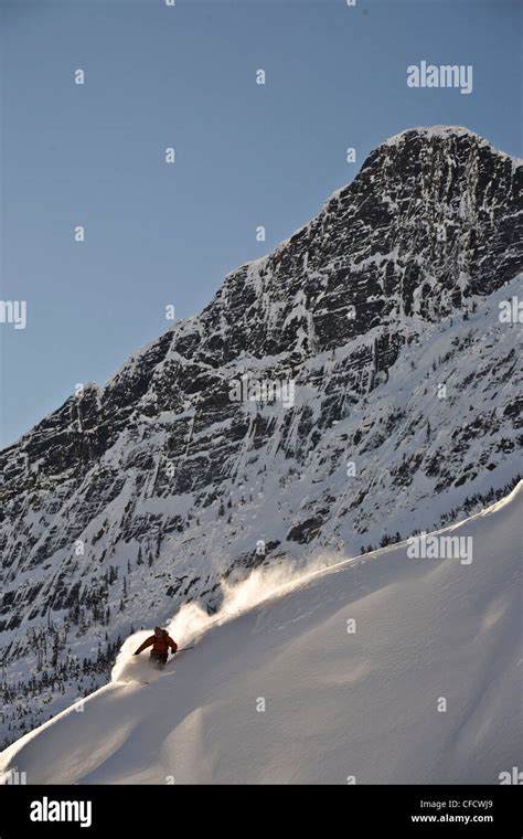 A Male Freeskier Backcountry Skiing In Rogers Pass Glacier National Park British Columbia