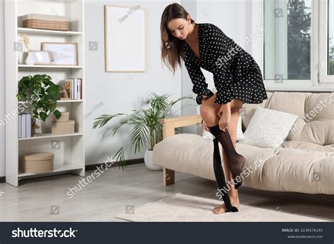 1 Thousand Woman Putting On Pantyhose Royalty Free Images Stock