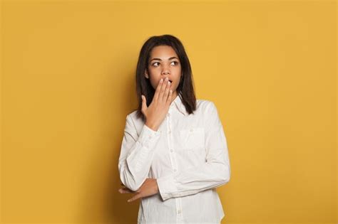 Premium Photo Shocked Black Woman Portrait On Yellow