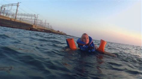 Alla Swims In The Sea And Wears A Rare Inflatable Vest And Inflatable Armbands Snorke Pro