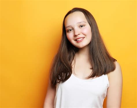 Premium Photo Portrait Of Young Positive Female With Cheerful Expression
