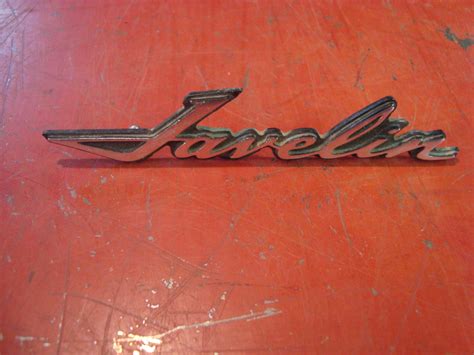 Amc Javelin Dash Emblem 4and14″ Long 1971 Through 1974 Danny L Sharer Dba Down And Dirty Dans