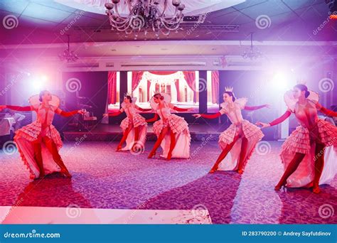 Girls Dancers In Beautiful Stage Costumes Dancing At A Festive Banquet