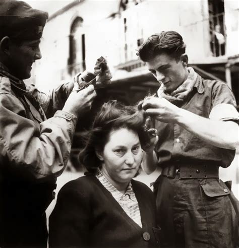 French Female Collaborator Punished By Having Her Head Shaved To