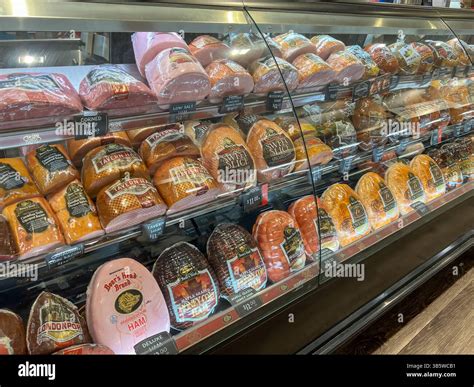Varieties Of Processed Deli Meats In Display Freezer In A Supermarket