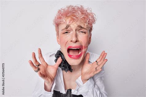 Upset Crying Pink Haired Gay Spreads Palms Looks Desperate At Camera Has Doleful Sad Expression