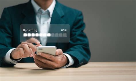 Premium Photo Businessman Installing Update Process On Smartphone Software Updates Or