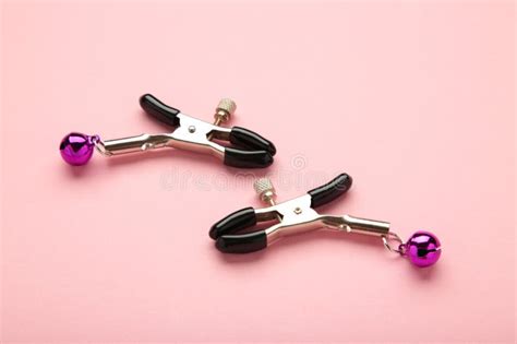 Nipple Clamps Made Of Metal With Pink Bells Bdsm Sex Games Stock Image Image Of Bondage Pink
