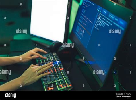 Unrecognizable Young Woman Sitting In A Gamer Armchair Typing On A