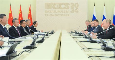 Xvi саммит БРИКС Встреча президента Владимира Путина и председателя КНР Си Цзиньпина Фотобанк