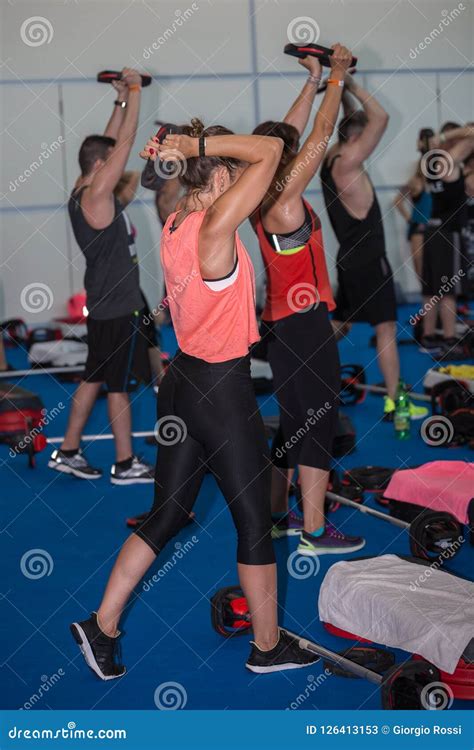 Fitness Workout In Gym People Doing Exercises In Class With Step