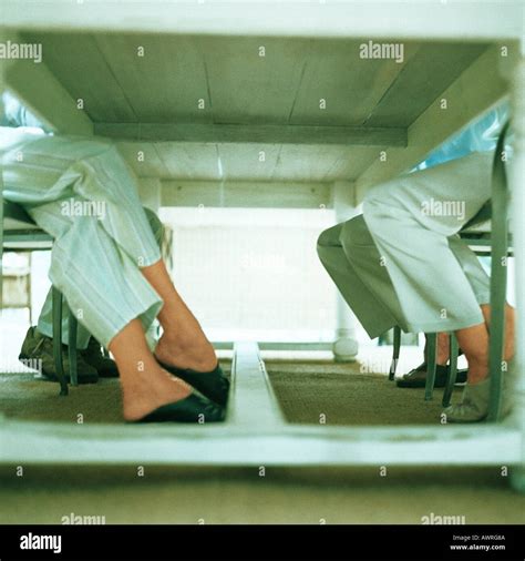 Legs Under Table High Resolution Stock Photography And Images Alamy