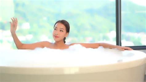 An Asian Woman Comfortably Taking Bath Stock Video Pond