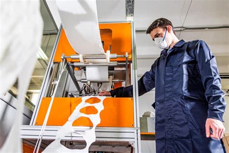 Premium Photo The Guy Works In A Factory For The Manufacture Of