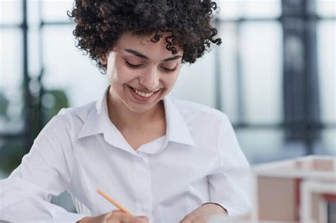 Premium Photo Female Architect Designer Examines House Layout