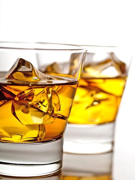Premium Photo Whiskey On The Rocks In An Old Fashion Glass