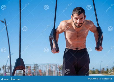 Shirtless Man Doing Loop Exercises Outdoors Stock Image Image Of Exercises Abdominal