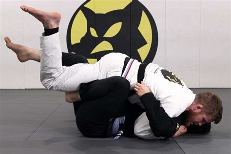 Passing Half Guard Counter The Butterfly Leg Weave To Full Mount Greg Walker Jiu Jitsu