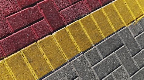 Premium Photo High Angle View Of Multi Colored Pattern On Footpath