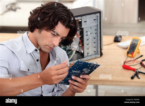 Man Repairing Pc Stock Photo Alamy