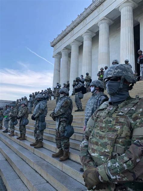 Unmarked Camouflaged Police Military Or Other Personnel Patrol The Capitol Mall In Washington