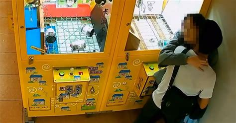 Randy Couple Perform Sex Act Next To Amusement Arcade Machines But Are Spotted On CCTV World
