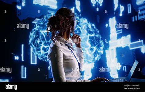 Qualified Technician Using Laptop To Maintenance Artificial