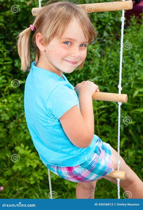 Happy Girl On A Rope Ladder Stock Image Image Of Bars Blonde 45036813