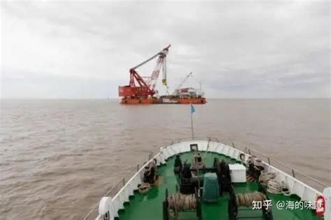 长江口二号古船将完成整体打捞迁移已清理出豆青釉碗等陶瓷器 知乎