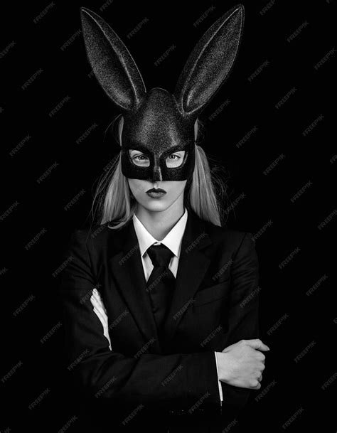 Premium Photo Portrait Of A Happy Woman In Bunny Ears Winking Sexy