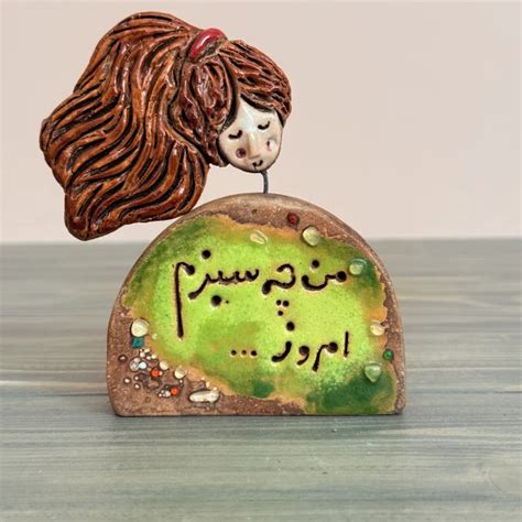 مجسمه سفالی دخترک طرح سه فروشگاه ایدرا