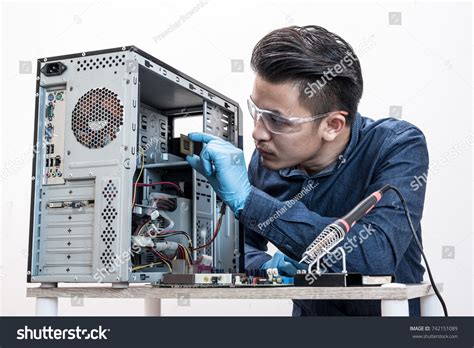 Asian Technician Putting Cpu On Socket Stock Photo Shutterstock