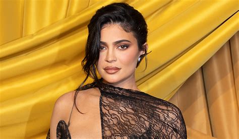 Kylie Jenner Wears A Mugler Lace Catsuit To Paris Fashion Week