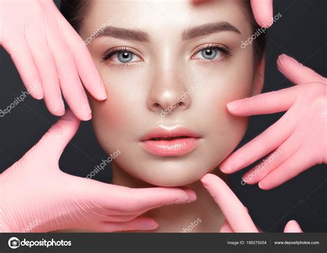 Beautiful Young Girl With Natural Nude Make Up With Cosmetic Tools In