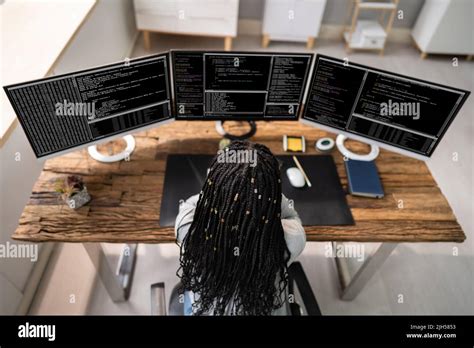 African American Coder Using Computer At Desk Web Developer Stock