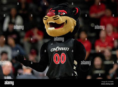 The Cincinnati Mascot Performs During An Ncaa College Basketball Game