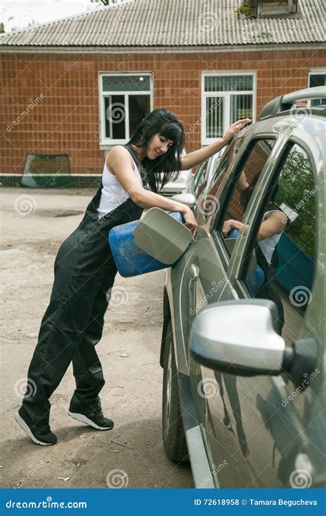 Girl Auto Mechanic Pours Gasoline Stock Photo Image Of Assistance Outdoors
