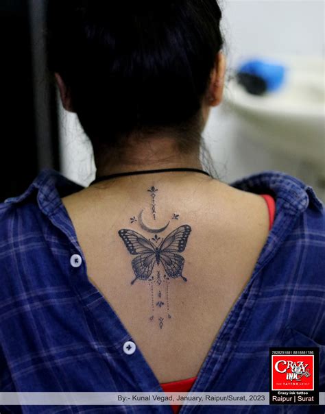 Butterfly Tattoo At The Back