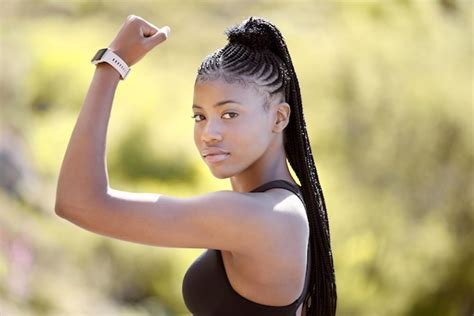 Premium Photo Fitness Flexing And Black Woman With Muscle In Nature