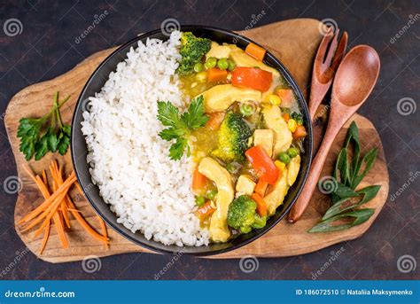 White Rice With Chicken And Vegetables And Curry Sauce Indian Dish Rice With Vegetables And