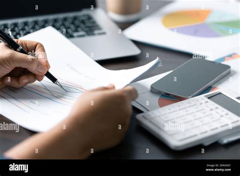 Business Data Analysis On Laptop Financial Charts Graphs Reports For Successful Planning And