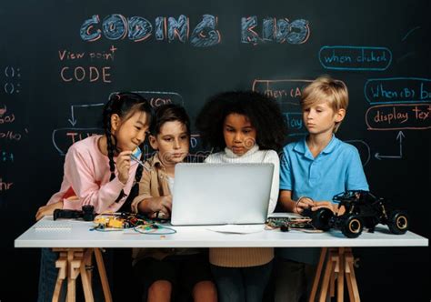 Student Learn About Coding Robotics Car In Stem Class With Attention