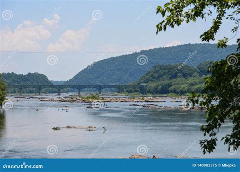 Scenic View Of The Potomac River With People Lounging On Lazy River
