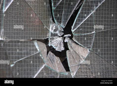 Smashed Reinforced Glass Window In Belfast City Centre Stock Photo Alamy