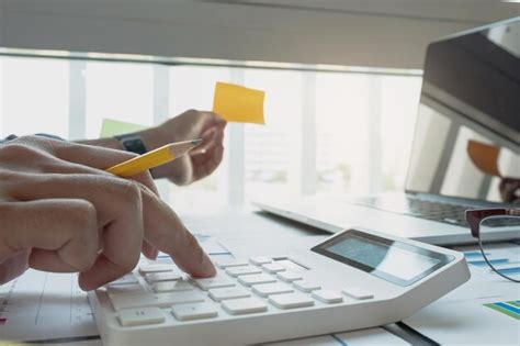 Premium Photo Man Using Laptop On Table