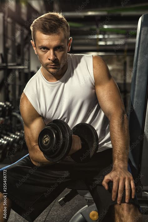 Intense Training Vertical Shot Of A Serious Young Handsome Man Looking