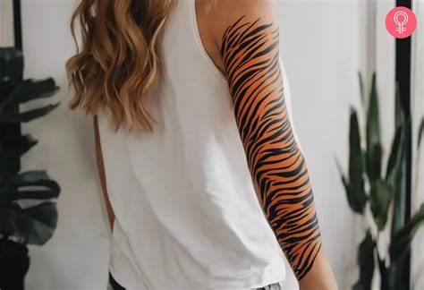 Tiger Stripe Arm Sleeve Tattoo Bold Style And Symbolic Meaning