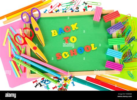 Small Chalkboard With School Supplies On White Background Back To