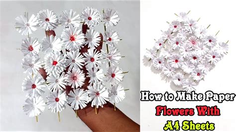 How To Make Paper Flowers With A4 Sheets සුදු කඩදාසි වලින් බිත්තියේ එල්ලන මල් සැරසිල්ලක් Youtube