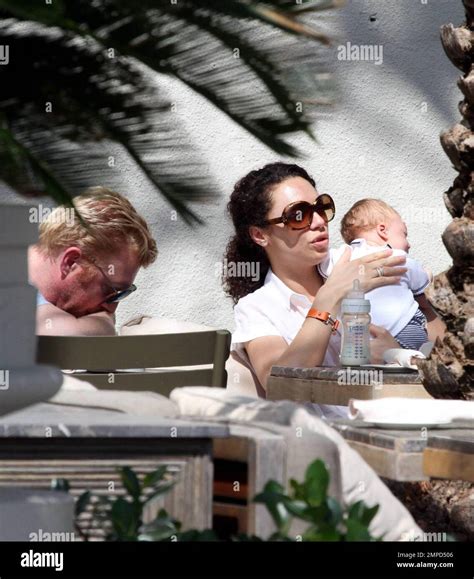 Tennis Ace Boris Becker Walks Along Miami Beach Boardwalk Yawning And